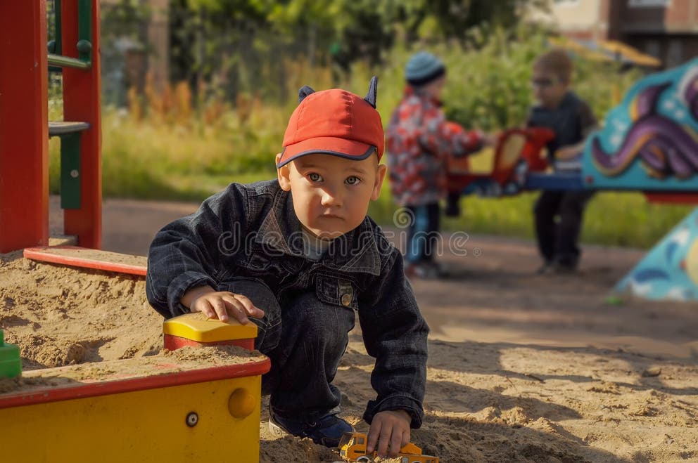Boy stock photo. Image of clothing, walk, sand, baseball - 83386748