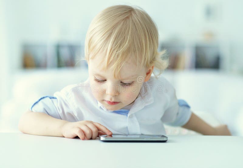 Boy is Playing with a Mobile Phone Stock Image - Image of smart, little ...