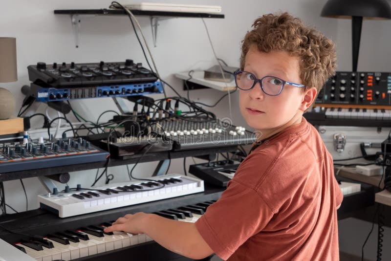 Boy Playing Music with Keyboard Stock Photo - Image of portrait, music ...