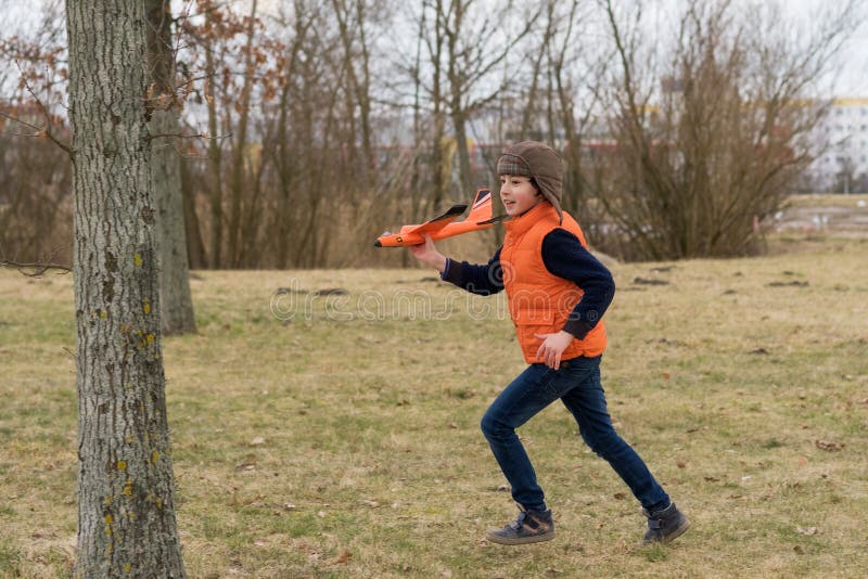 Boy playing in the nature stock image. Image of active - 176390103