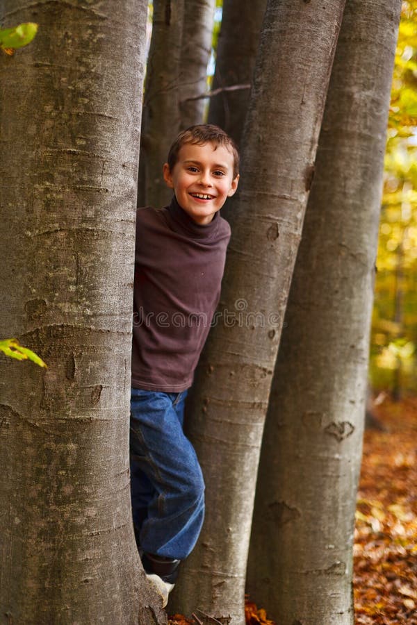 Boy playing outdoor stock image. Image of child, cute - 16810103
