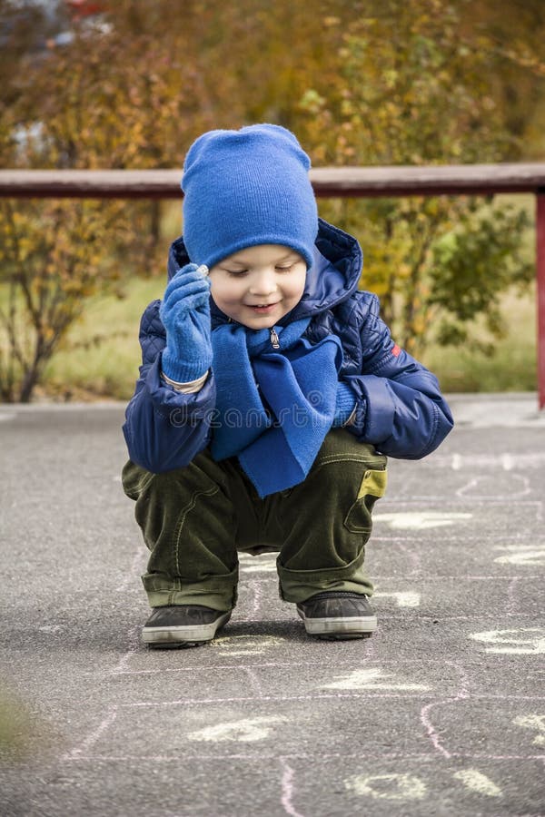 Boy playing outside stock image. Image of outside, child - 61908703