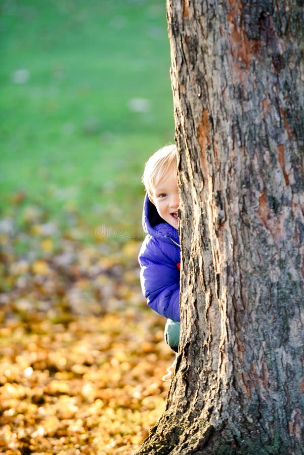 Boy Playing Outside in a Park Stock Photo - Image of caucasian, camera ...