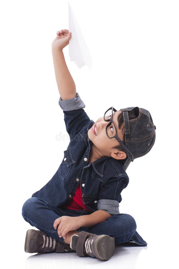 Boy playing paper airplane stock image. Image of casual - 49502363