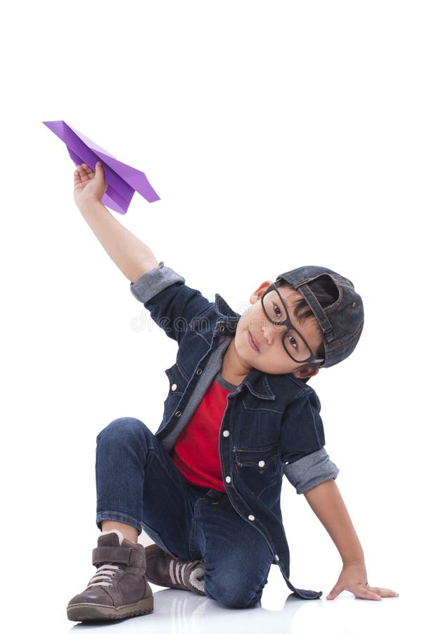 Boy playing paper airplane stock image. Image of toddler - 49503719