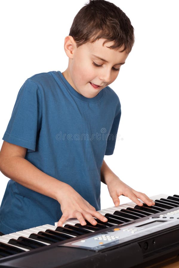 Boy playing piano stock photo. Image of repeat, piano - 18688800