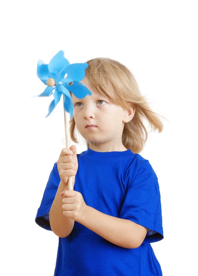 Boy playing with pinwheel stock image. Image of childhood - 20650747