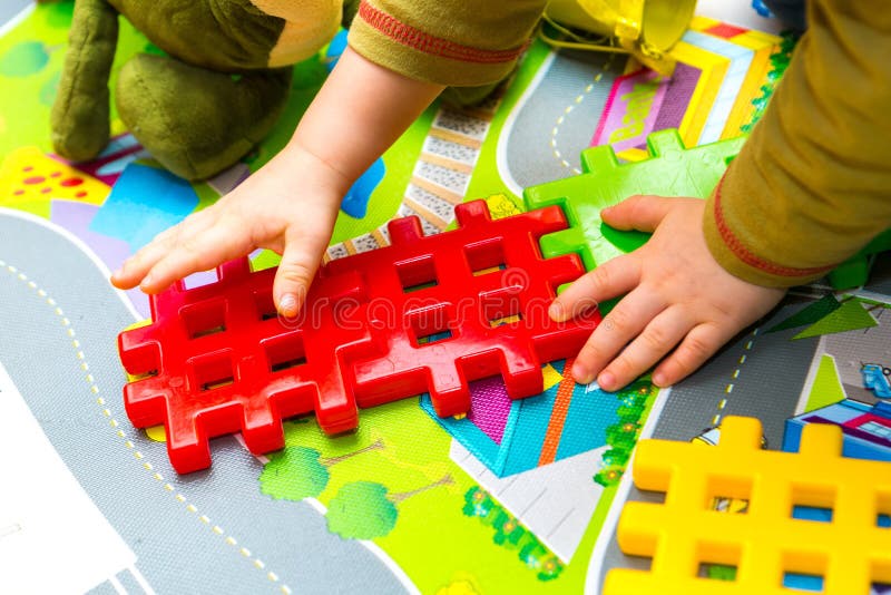 Boy Playing with Plastic Blocks in Home Stock Photo - Image of family ...