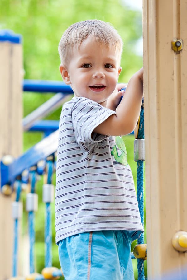 Boy at playground stock image. Image of cute, playing - 11058515