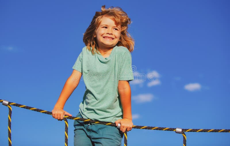 Boy Playing in the Playground. Kids Play Outdoor. Stock Image - Image ...