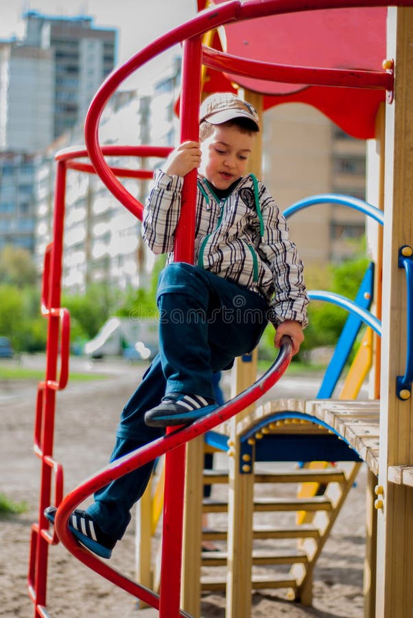 Boy Playing on the Playground Editorial Photo - Image of years, playing ...