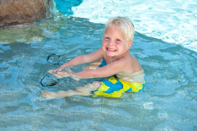 Boy playing in pool stock image. Image of pool, heat - 16087869