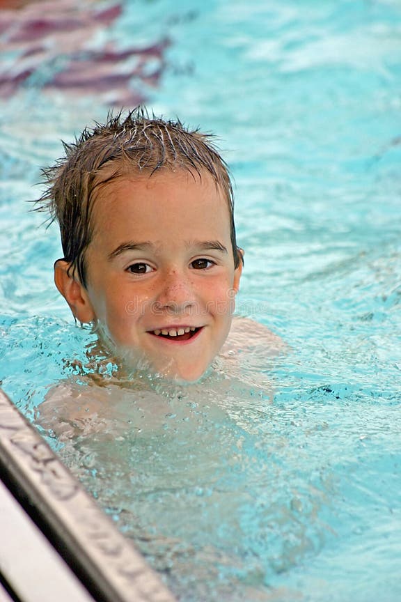 Boy Playing in the Pool stock photo. Image of model, little - 4628234