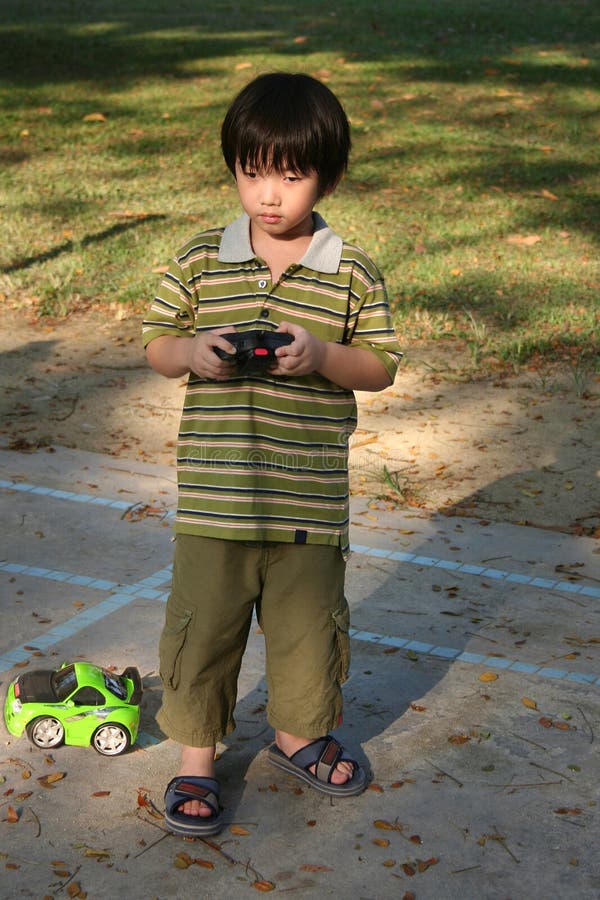 Boy Playing Remote Control Car Stock Photo - Image of play, chinese ...