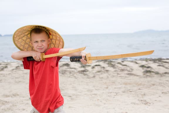 Boy Playing with Samurai Swords Made Stock Photo - Image of culture ...