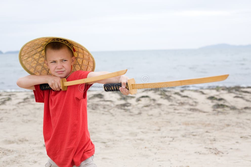 Boy Playing with Samurai Swords Made Stock Photo - Image of culture ...