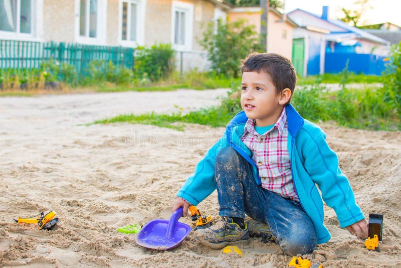 Boy Playing in the Sand in Summer Stock Photo - Image of countryside ...