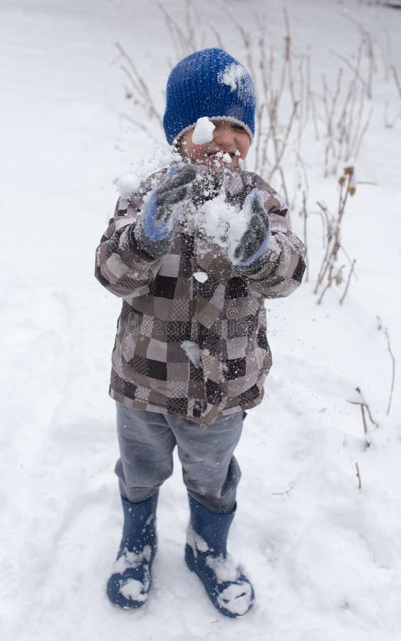 Boy Playing with Snow in Winter Stock Photo - Image of cold, playing ...