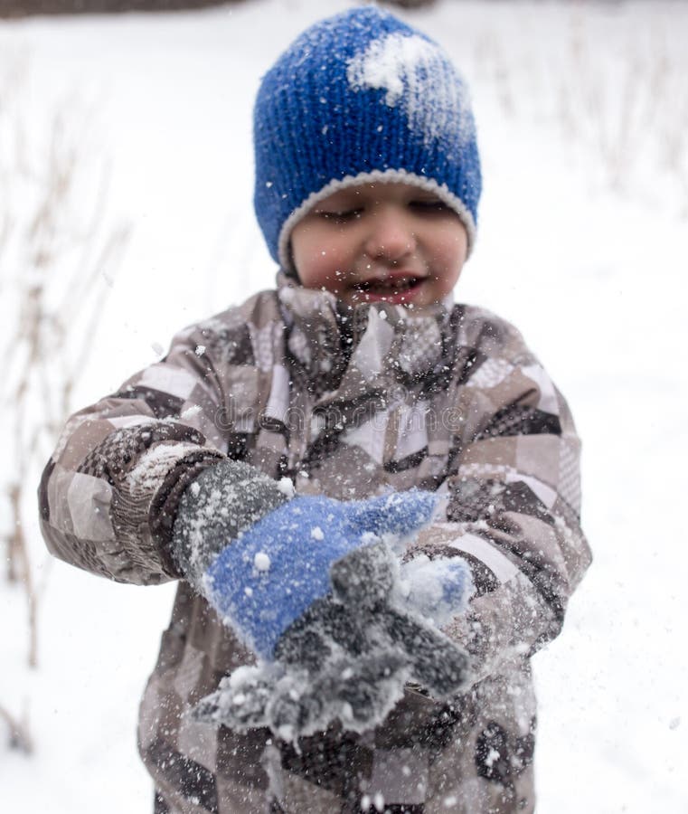 Boy Playing with Snow in Winter Stock Image - Image of baby, children ...