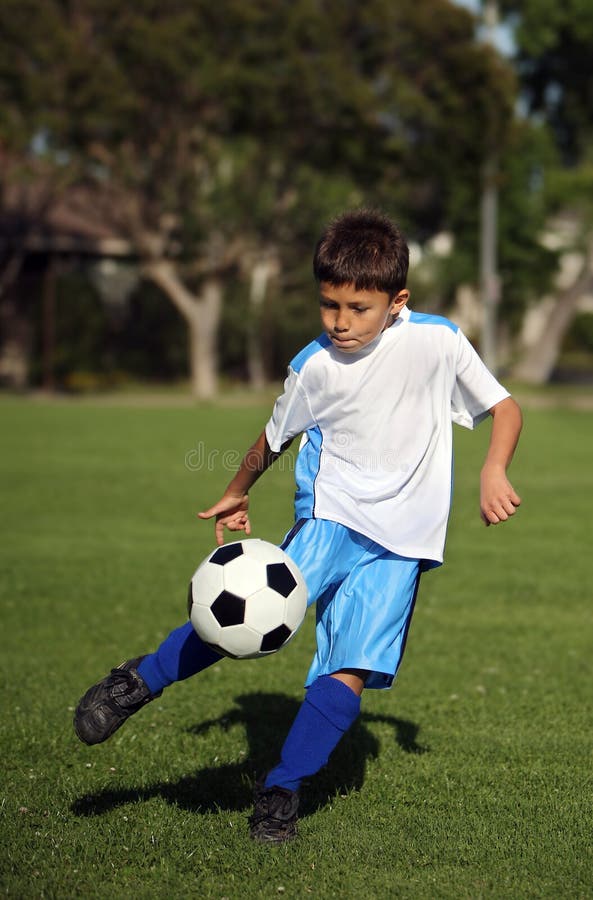 Boy playing soccer stock photo. Image of ball, hispanic - 20044906