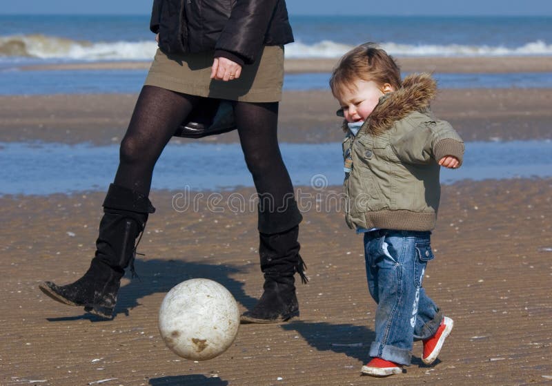 Boy Playing Soccer on the Beac Stock Photo - Image of happy, child: 2197196
