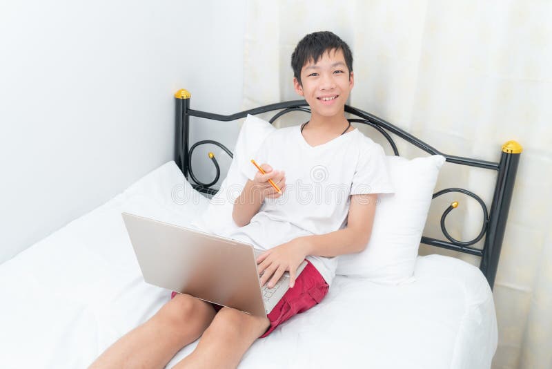 A Boy Playing Social Media with Laptop Stock Image - Image of happy ...