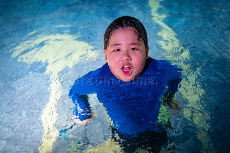 Fat Little Boy Swimming Stock Photos - Free & Royalty-Free Stock Photos ...