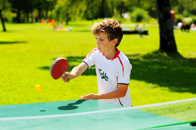 Boy Playing Table Tennis in the Park Stock Photo - Image of happy ...