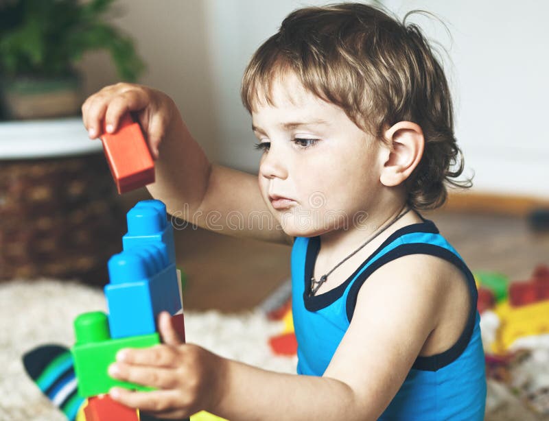 Boy Playing with Toy Blocks and Bricks Stock Photo - Image of playing ...