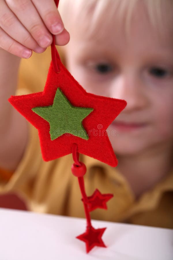 Boy playing with toy star stock image. Image of learning - 3830831