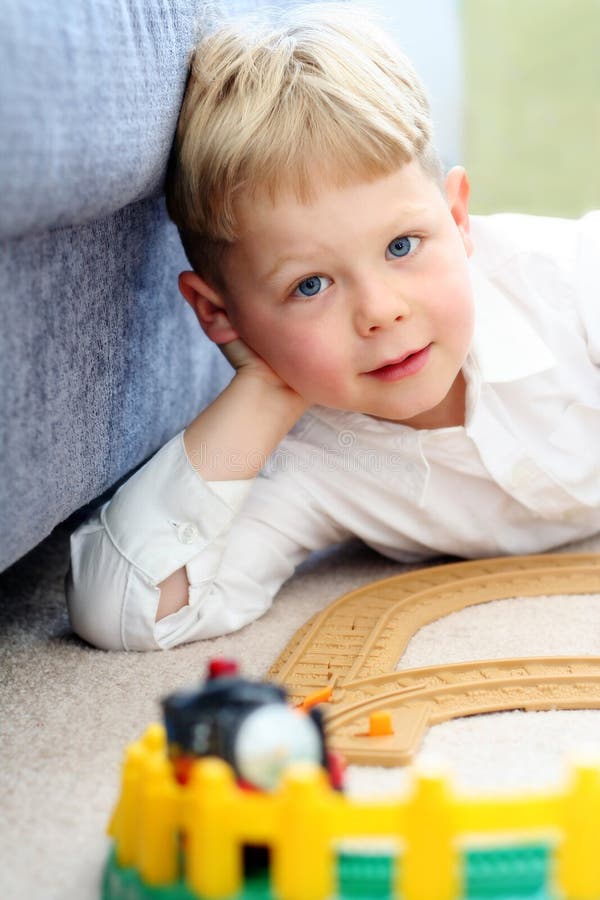 Boy playing with train stock photo. Image of tracks, train - 8155478