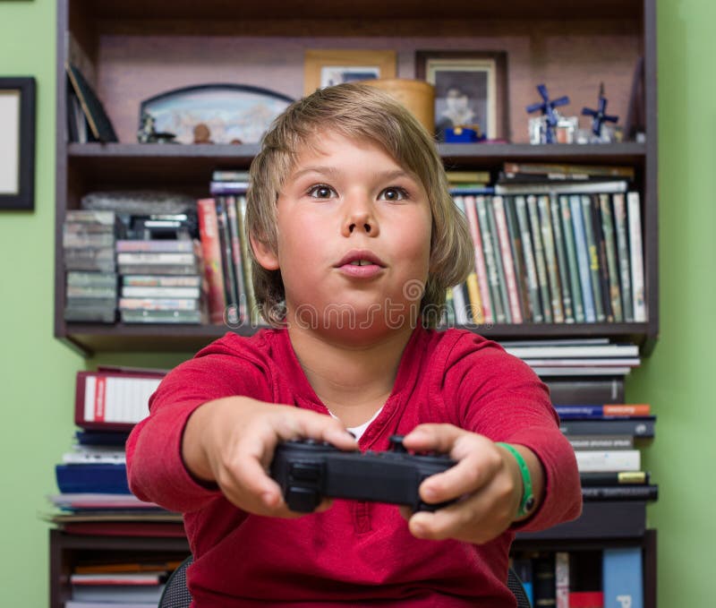 Boy playing on the PSP stock image. Image of happy, hobbies - 33005357