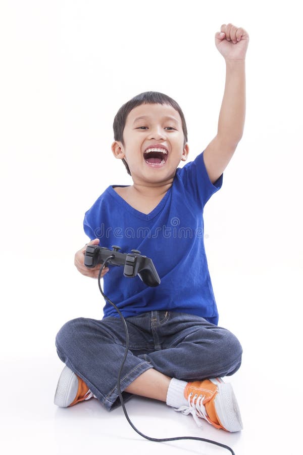 Boy playing video game stock photo. Image of childhood - 45787924