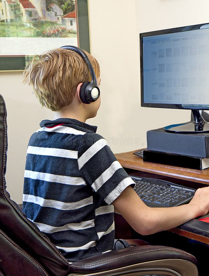 Boy Playing Video Games on Computer Stock Photo - Image of youthful ...