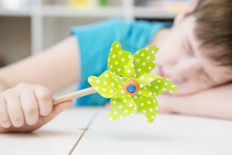 Boy Playing with Windmill at Home. Stock Image - Image of nature, color ...