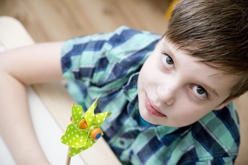 Boy Playing with Windmill at Home. Stock Image - Image of lifestyle ...