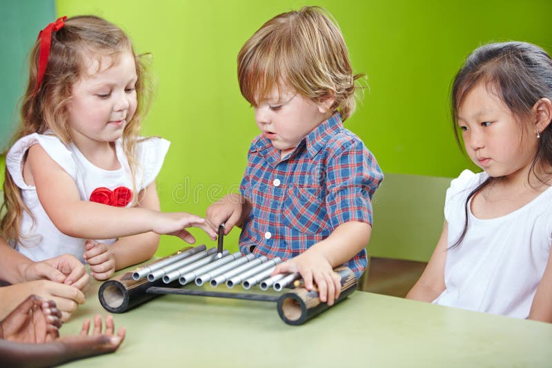 Kids Playing Music with Xylophone Stock Photo - Image of childhood ...