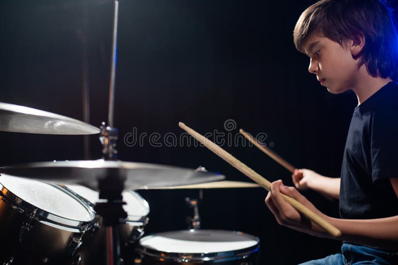 A Boy Plays Drums in a Recording Studio Stock Photo - Image of playing ...
