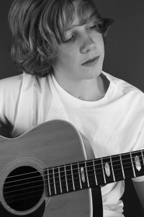 Boy with His Guitar in Sepia Stock Photo - Image of guitar, singer ...