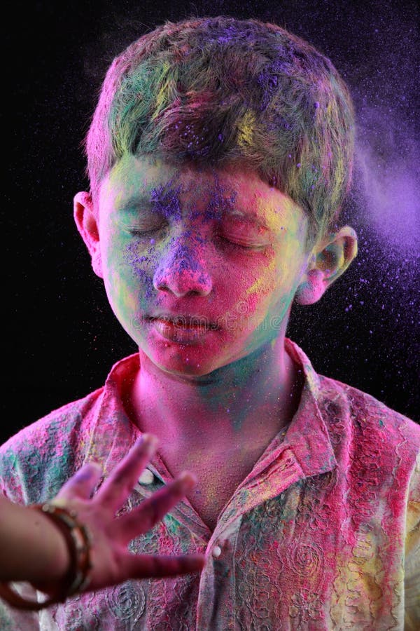 A boy plays Holi stock image. Image of effect, multi - 53733635