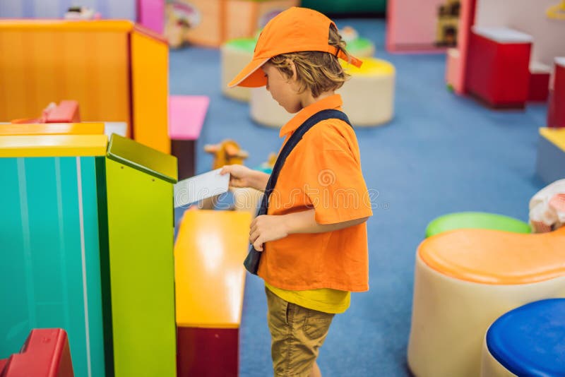 Happy Indian Delivery Boy Parcel Blue Stock Photos - Free & Royalty ...