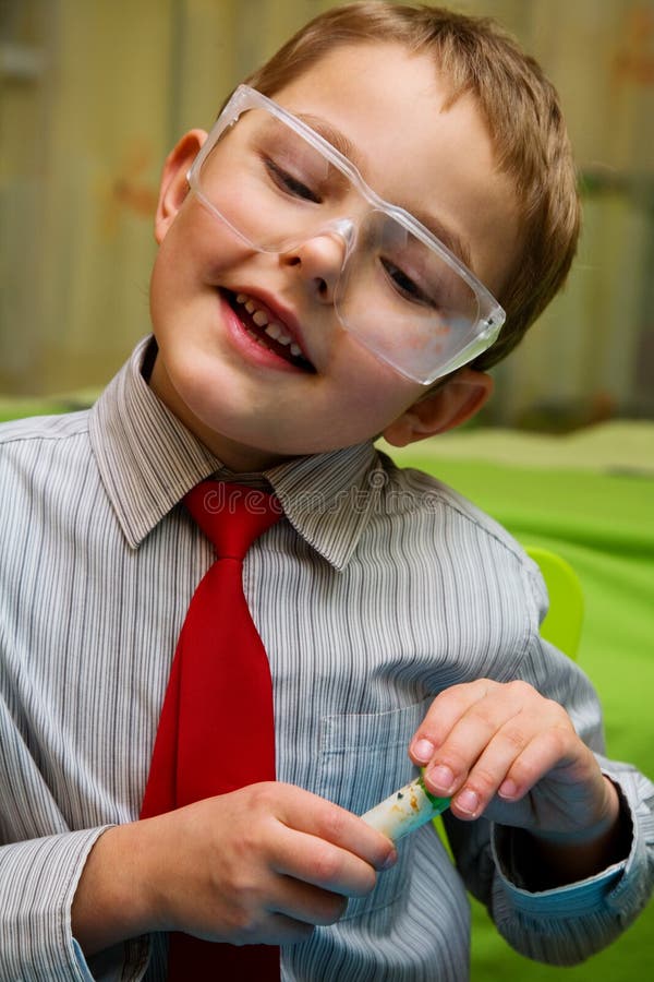 A Boy Plays in the Scientist Chemist Stock Photo - Image of little ... A Boy Plays in the Scientist Chemist Stock Photo - Image of little ...