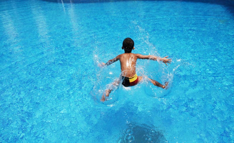 The boy plunge into water stock photo. Image of water - 5888786