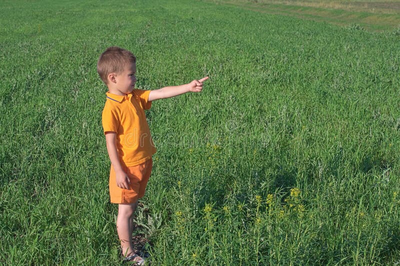 Boy point the finger right stock image. Image of present - 58958779