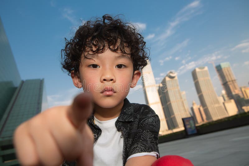 Boy pointing at the screen stock photo. Image of screen - 259353774