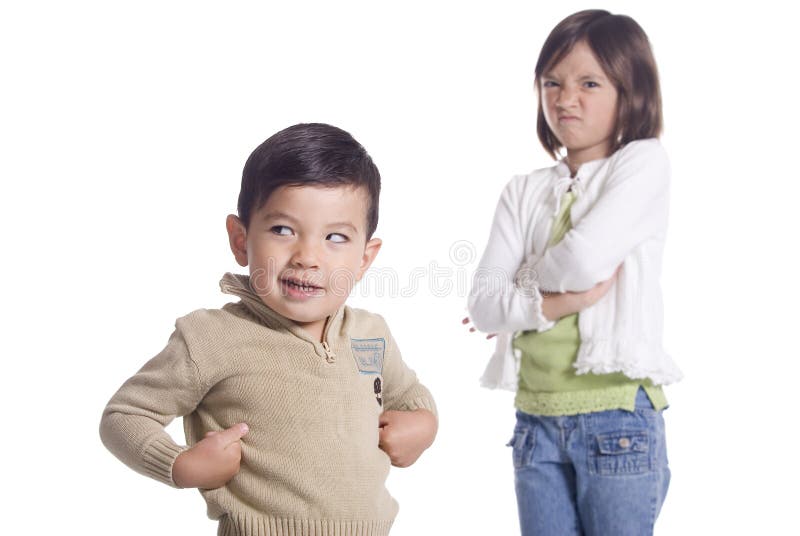 Boy pokes fun at sister. stock image. Image of sibling - 11184897