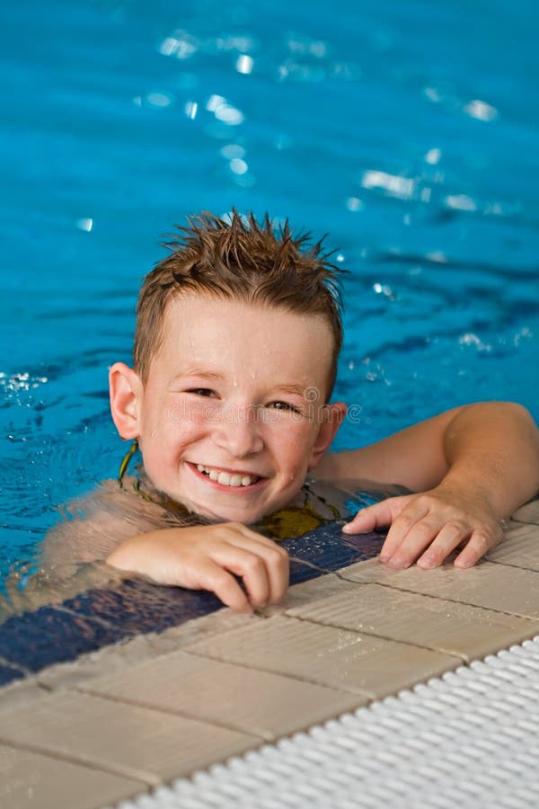 Boy in a pool stock photo. Image of glasses, blue, happy - 10801008