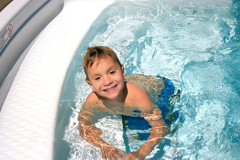 Boy in pool stock photo. Image of swimming, exercise, holiday - 1305518
