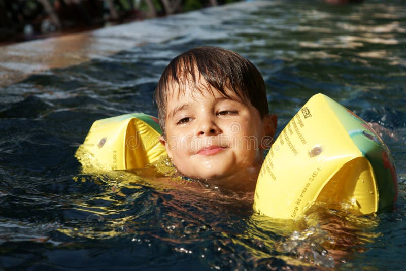 Boy at Pool stock image. Image of goggle, relaxing, cement - 1599187