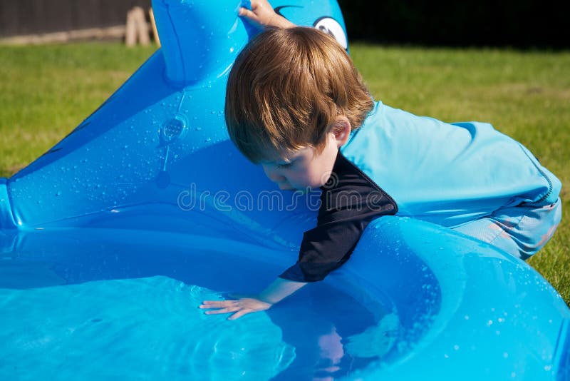 Boy in pool stock photo. Image of happiness, smiling - 20802872